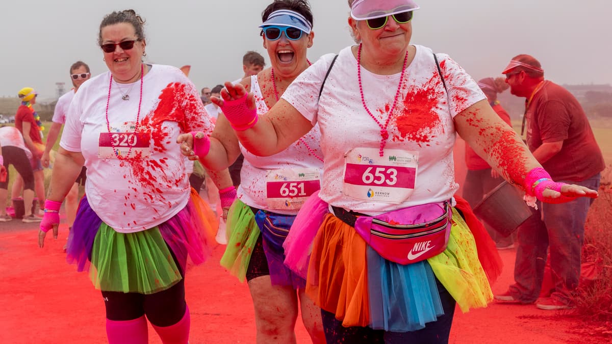 Runners covered in the colours of the rainbow for charity fun run ...